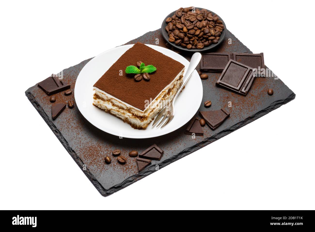 Traditional Italian Tiramisu square dessert portion on ceramic plate ...