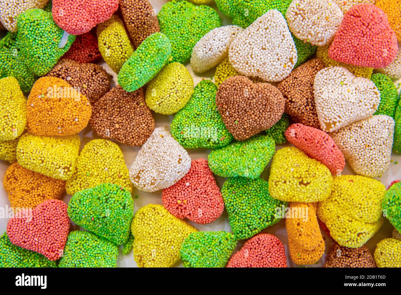 Colorful gummy heart shaped jelly sugar candies Stock Photo - Alamy