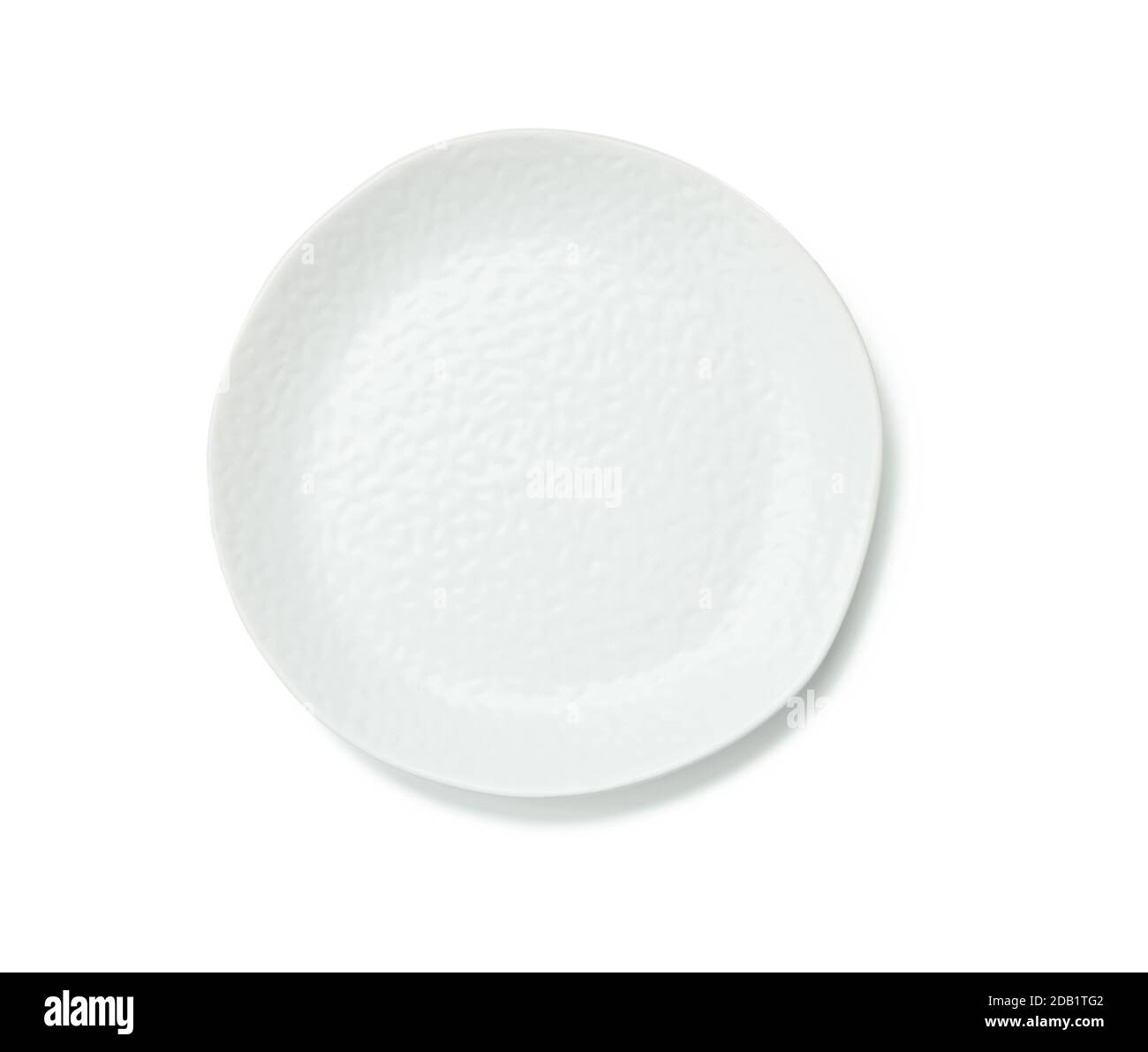 empty white round plate with jagged edges isolated on white background ...