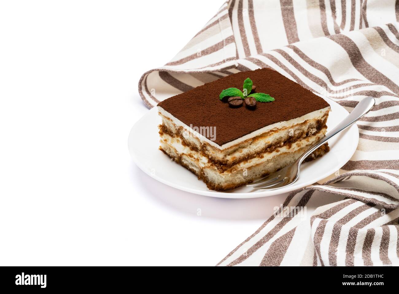 Traditional Italian Tiramisu square dessert portion on ceramic plate ...