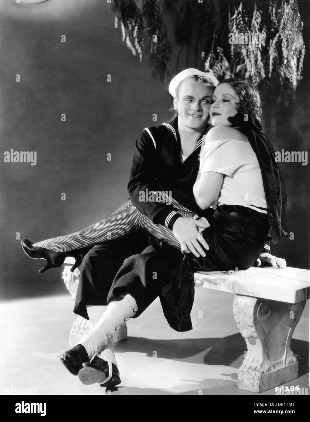 JAMES CAGNEY on set publicity pose with Chorus Girl for FOOTLIGHT ...