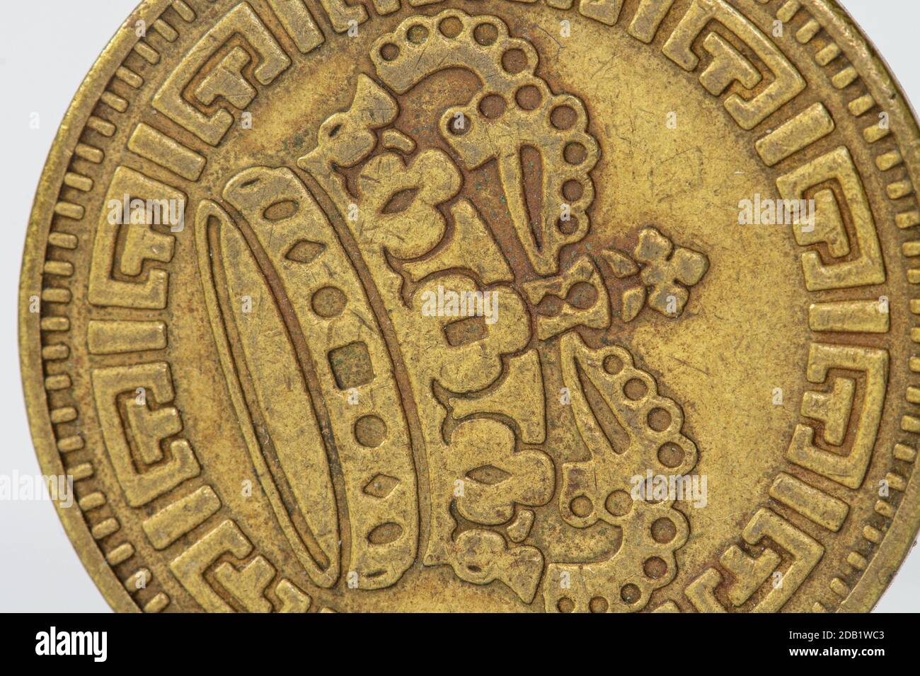 Old rusty ancient coin with detailed symbols, golden, isolated ...