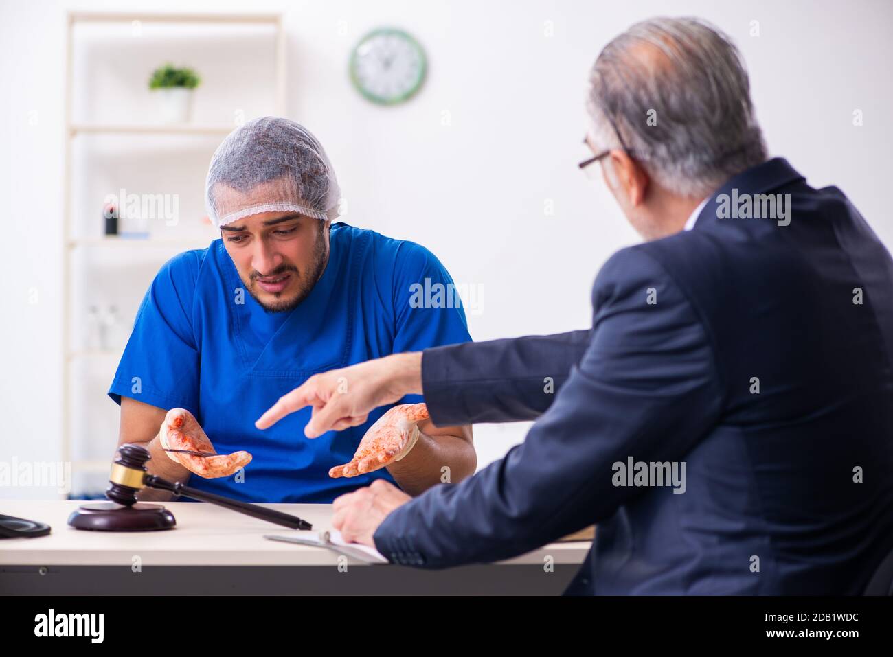 Doctor in courthouse meeting with advocate Stock Photo - Alamy