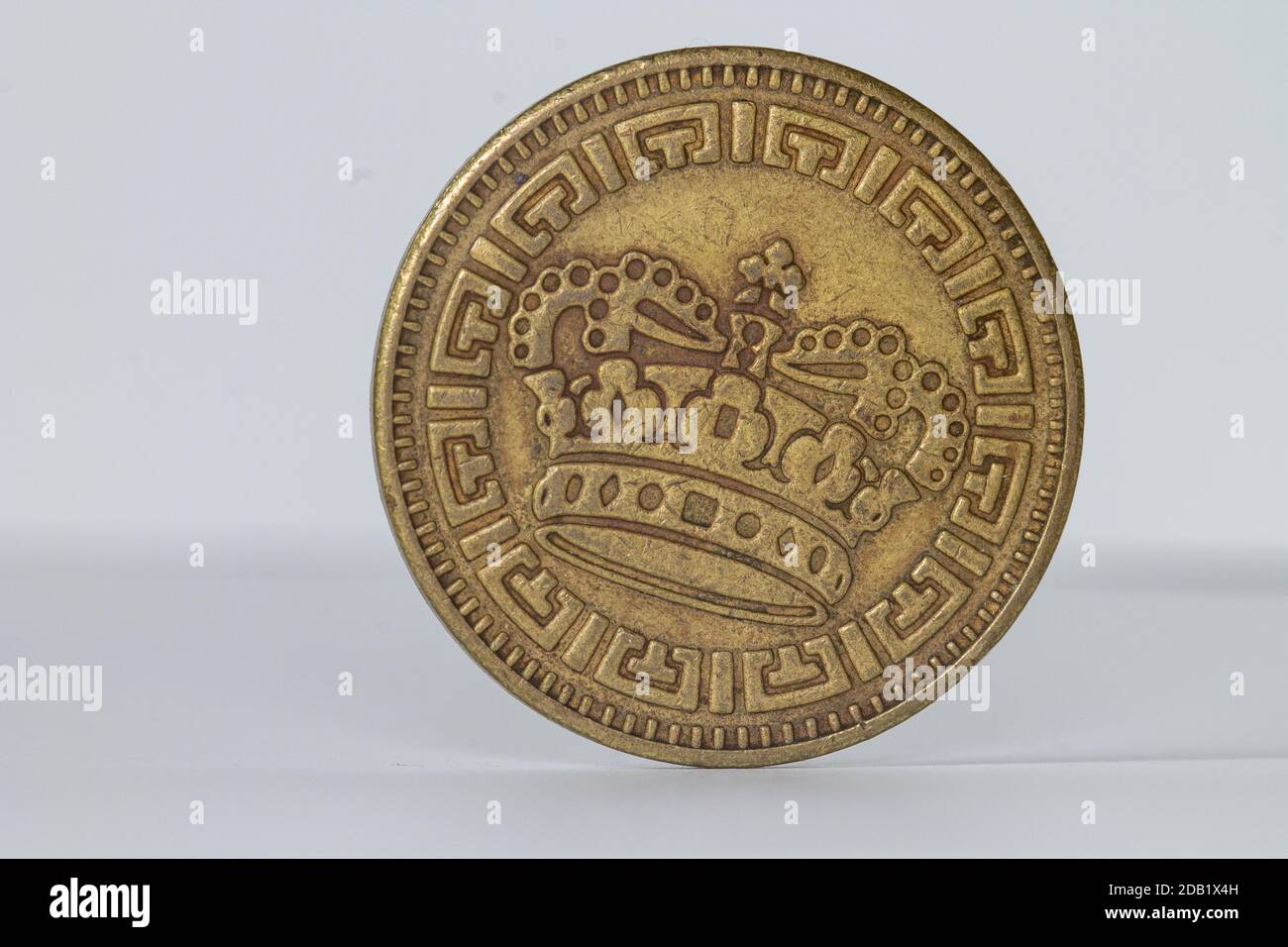 Old rusty ancient coin with detailed symbols, golden, isolated ...