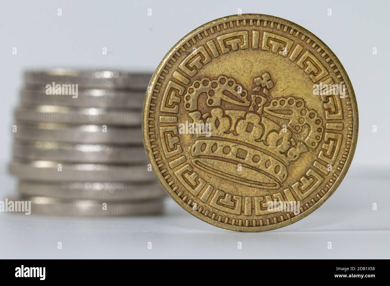 Old rusty ancient coin with detailed symbols, golden, isolated ...