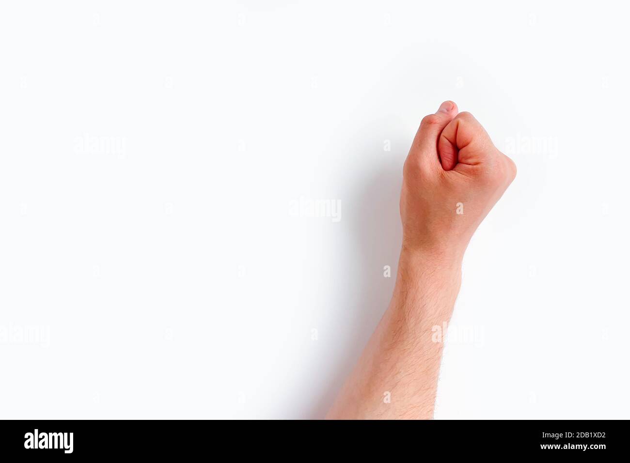Male fist on white background. Top view Stock Photo - Alamy