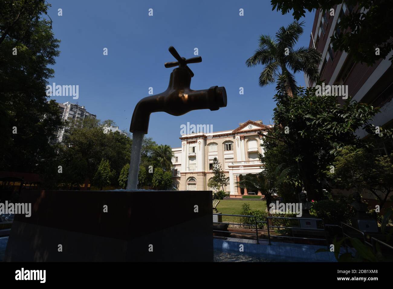 Giant Magic Tap, an outdoor floating tap fountain hovering above a pool ...