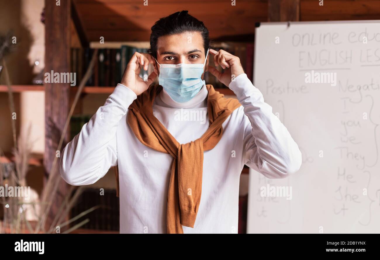 Male teacher wearing face mask hi-res stock photography and images - Alamy
