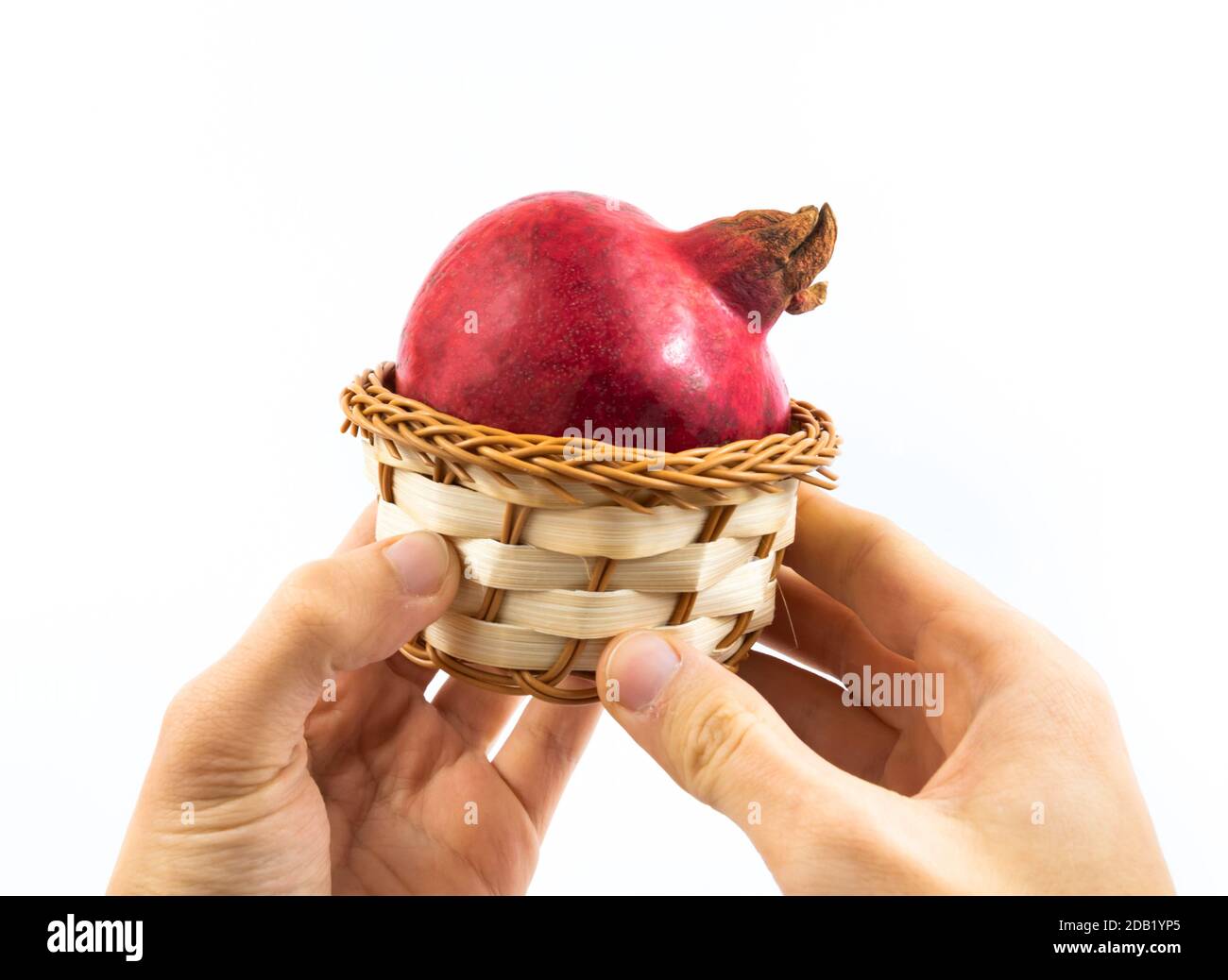A series of photos with pomegranate on a white isolated background with ...