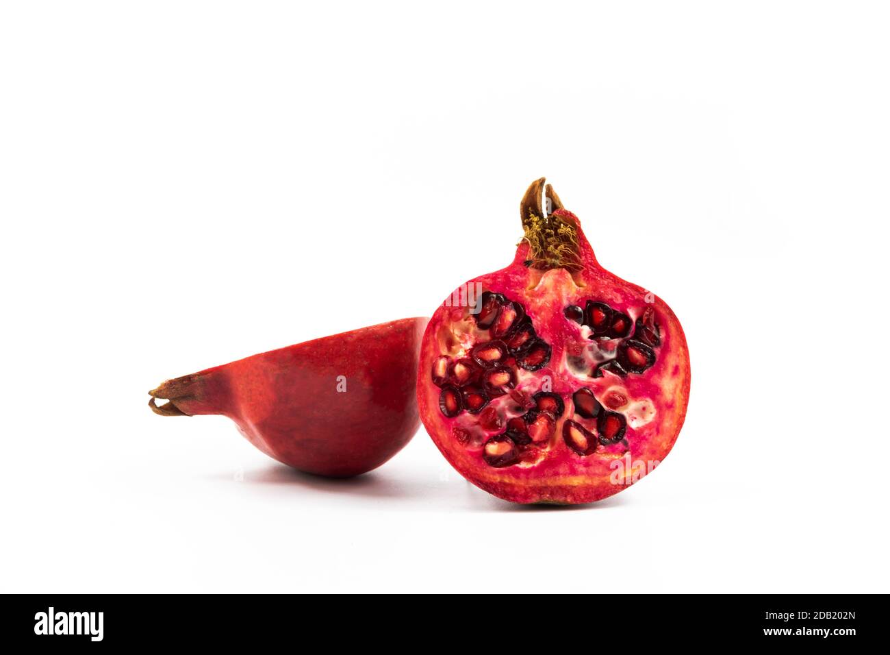A series of photos with pomegranate on a white isolated background with ...