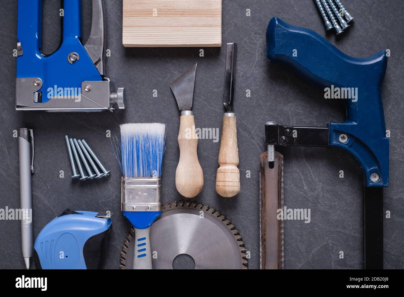 Different work construction tools for home renovation on table ...