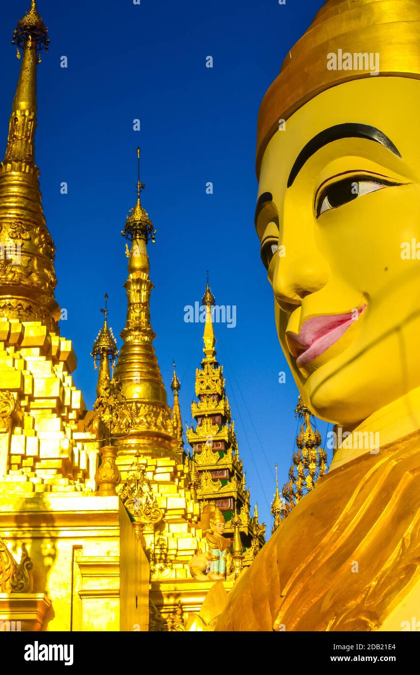 A vertical shot of the big statue of Gautama Buddha in Ngar Htat Gyi Pagoda, Yangon, Myanmar ...