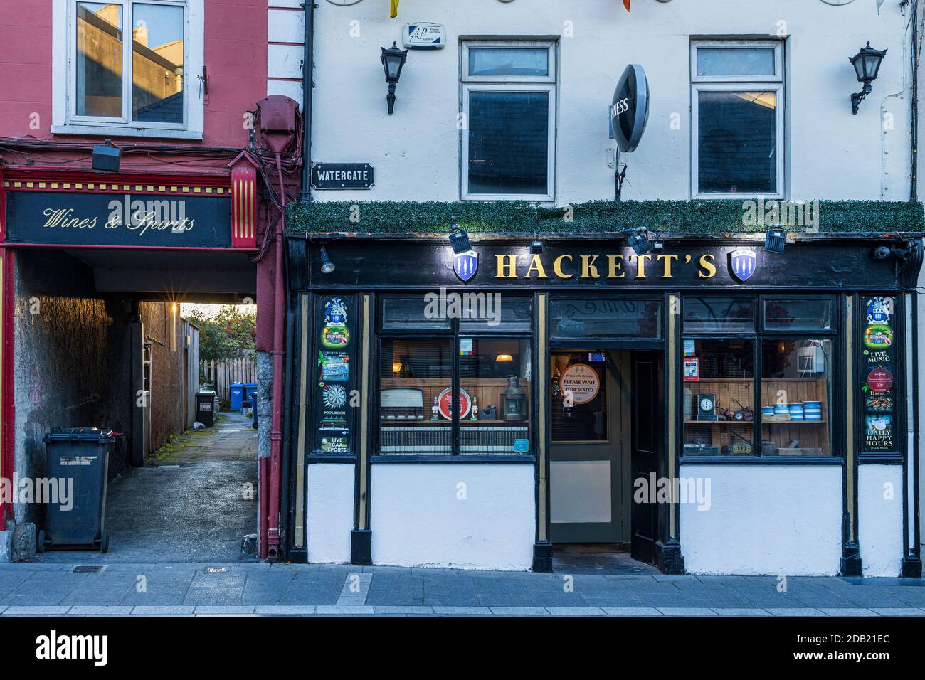 Hacketts public house on Watergate and alley next with rubbish bins in ...