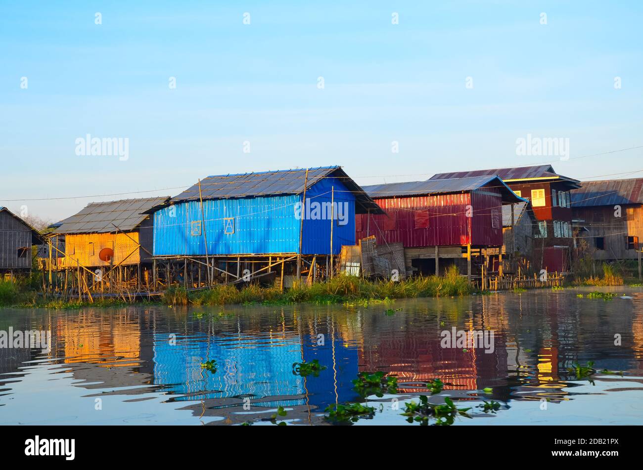 The traditional Burmese colorful houses on the Inle Lake in Myanmar ...