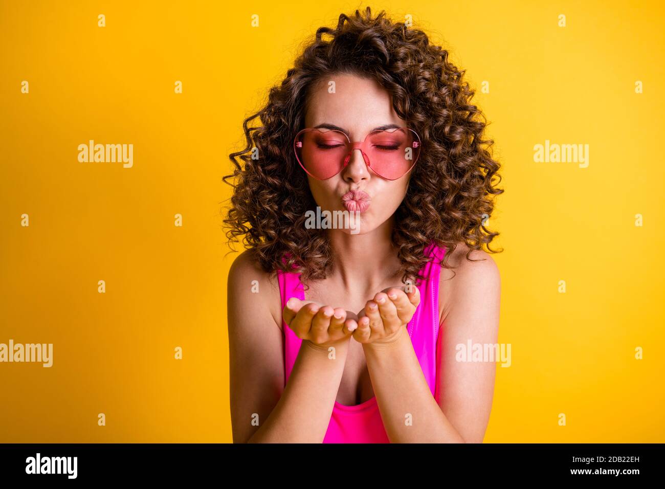 Photo of attractive cute girlish wavy hairdo lady blow air kiss open ...