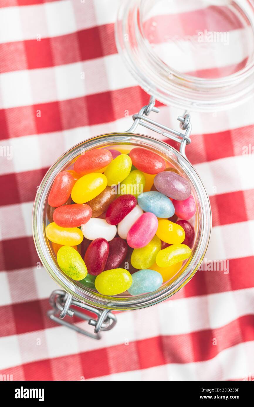 Fruity jellybeans. Tasty colorful jelly beans in glass jar Stock Photo ...