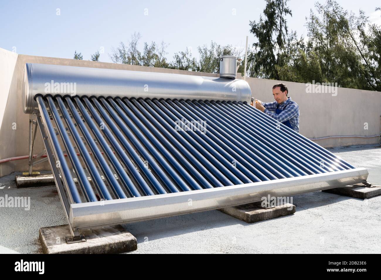 Solar water heater install hi-res stock photography and images - Alamy