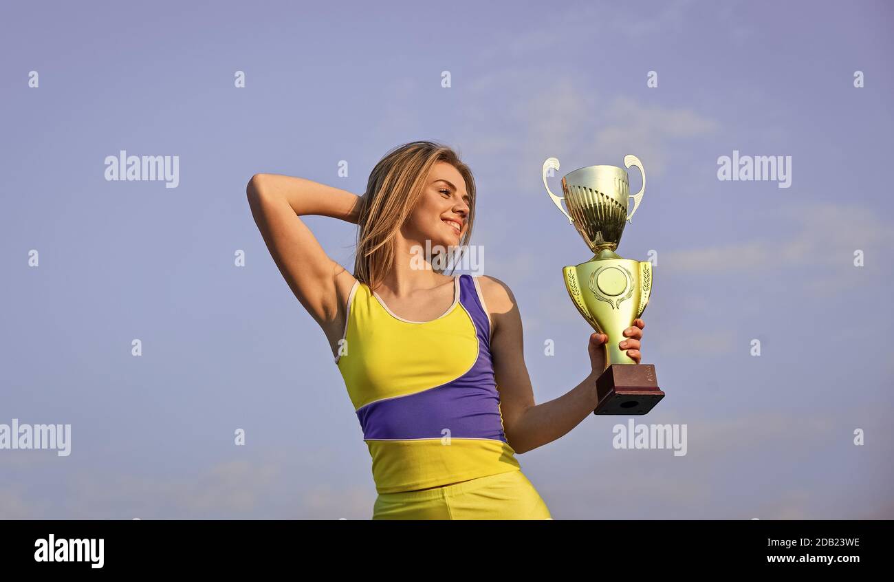 Winner in competition. Sport and health. Adorable cup winner. Sport and ...