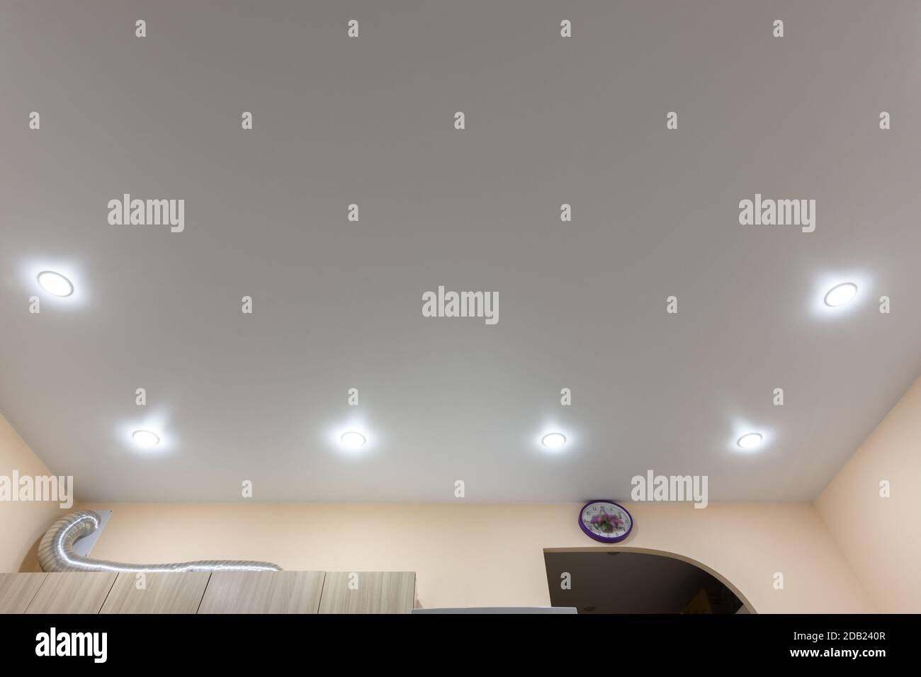 Location around the perimeter of point lights on a white matte tension ...