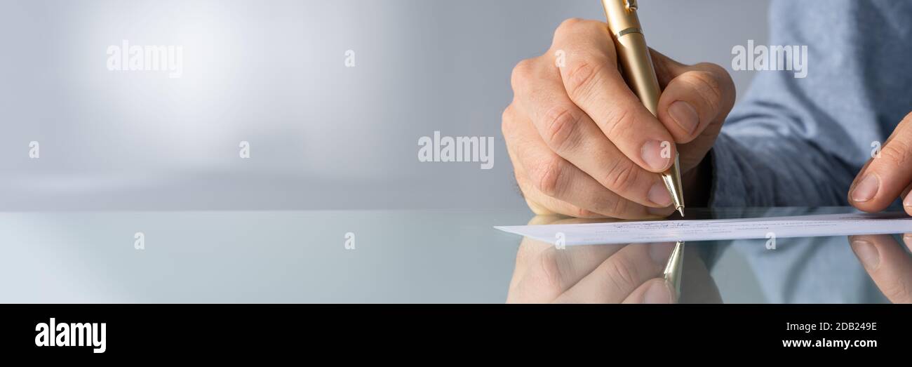 Cashier bank cheque hi-res stock photography and images - Alamy