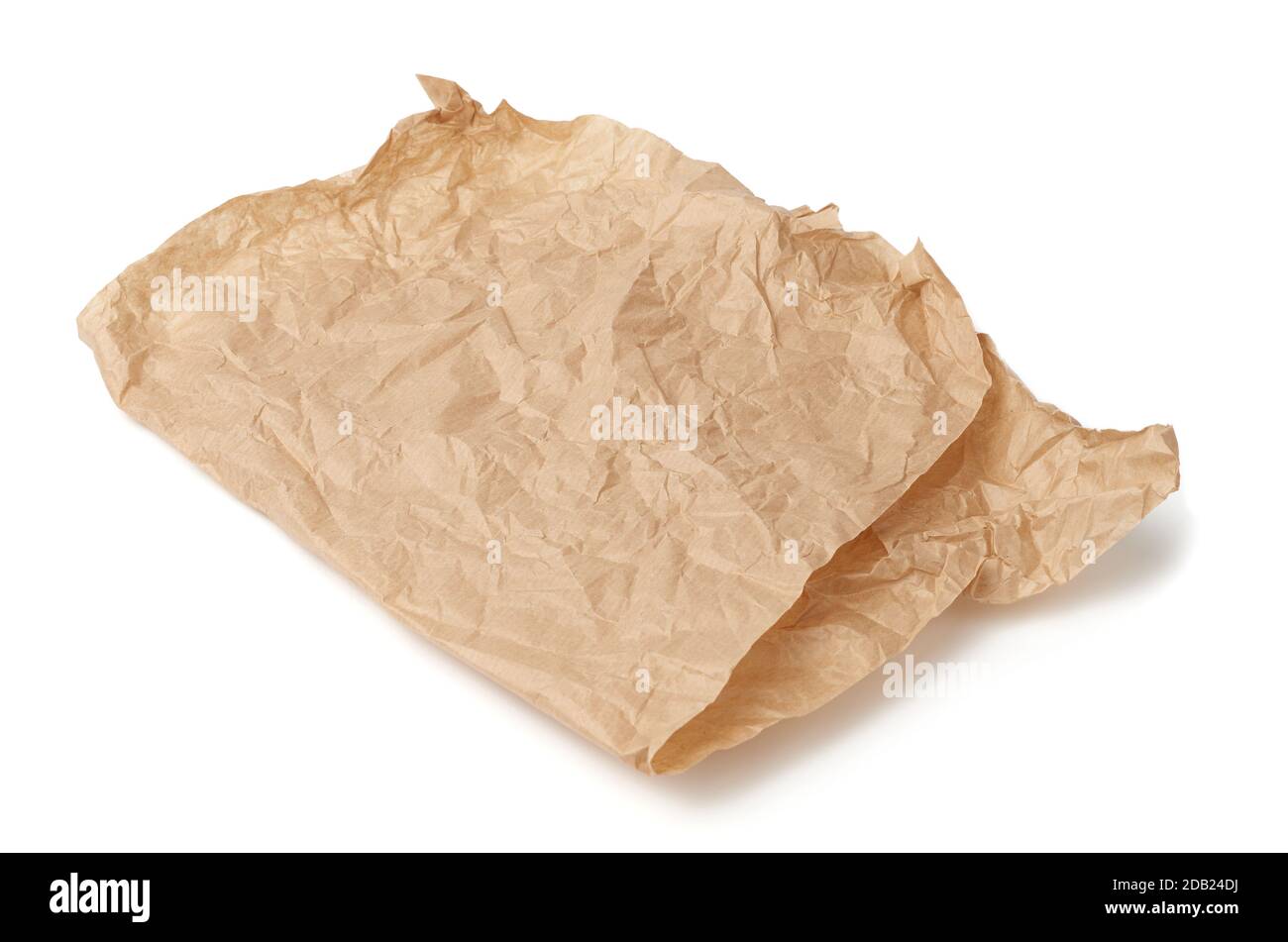 folded brown crumpled sheet of parchment paper isolated on white ...