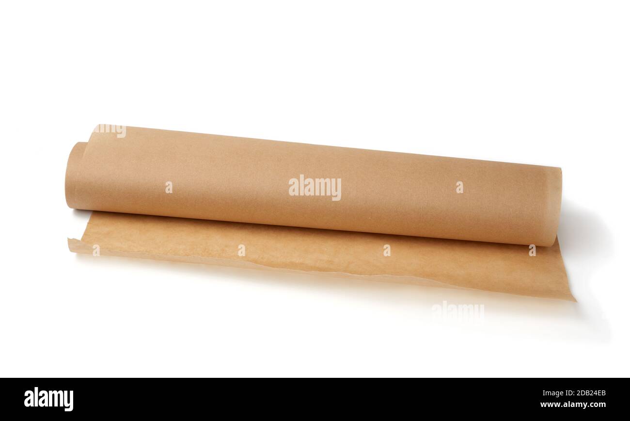 twisted roll of brown parchment paper isolated on a white background ...