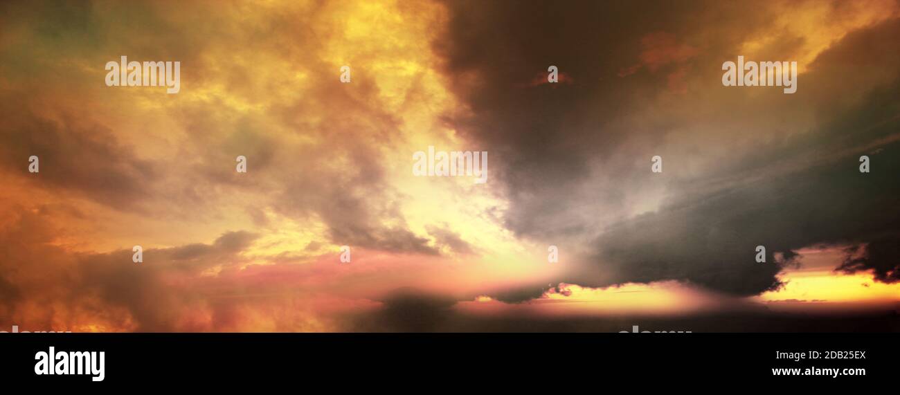 Dramatic sunset sky with tinted, colored clouds in summer season ...