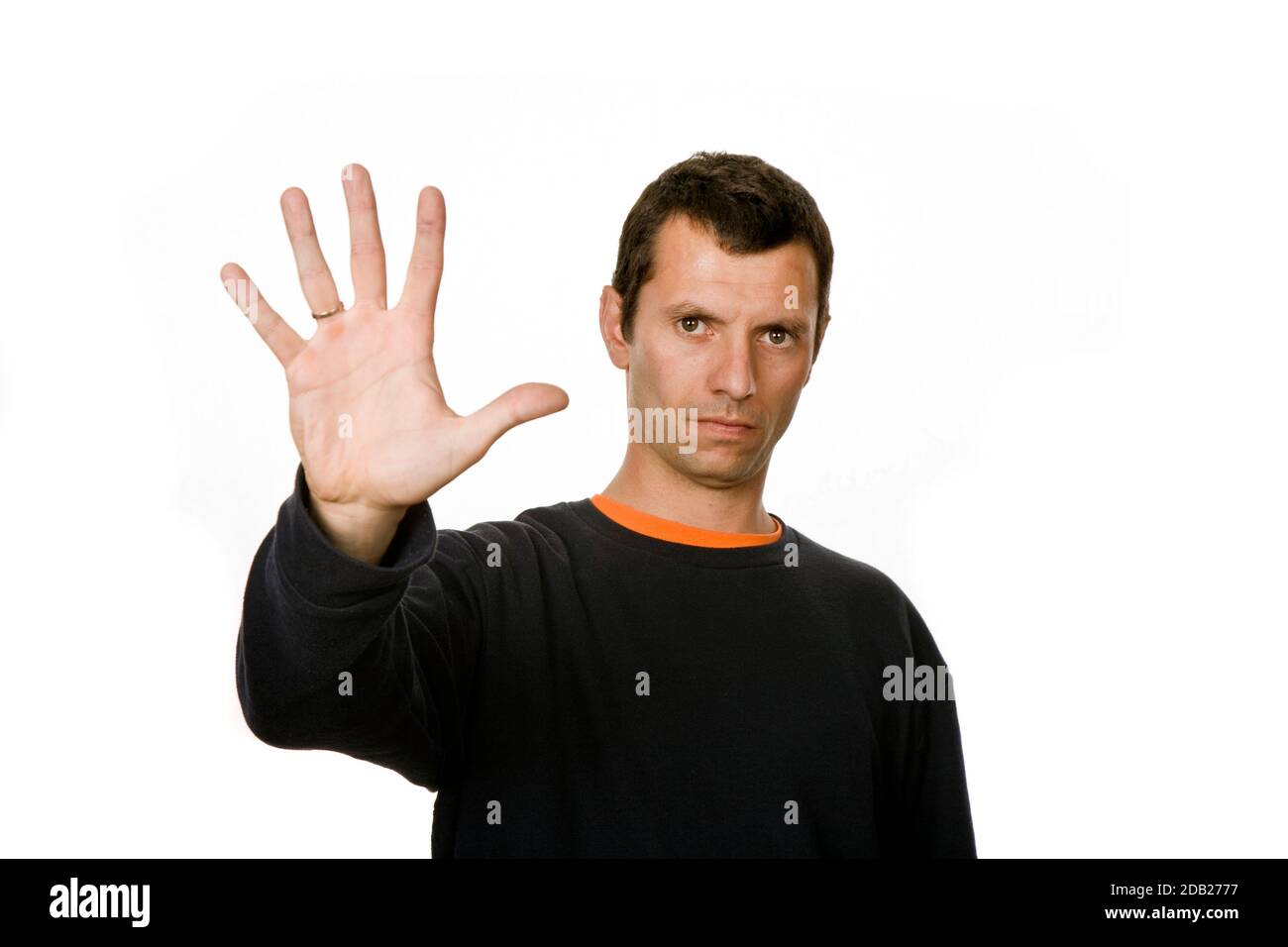 young man making stop with his hand Stock Photo - Alamy