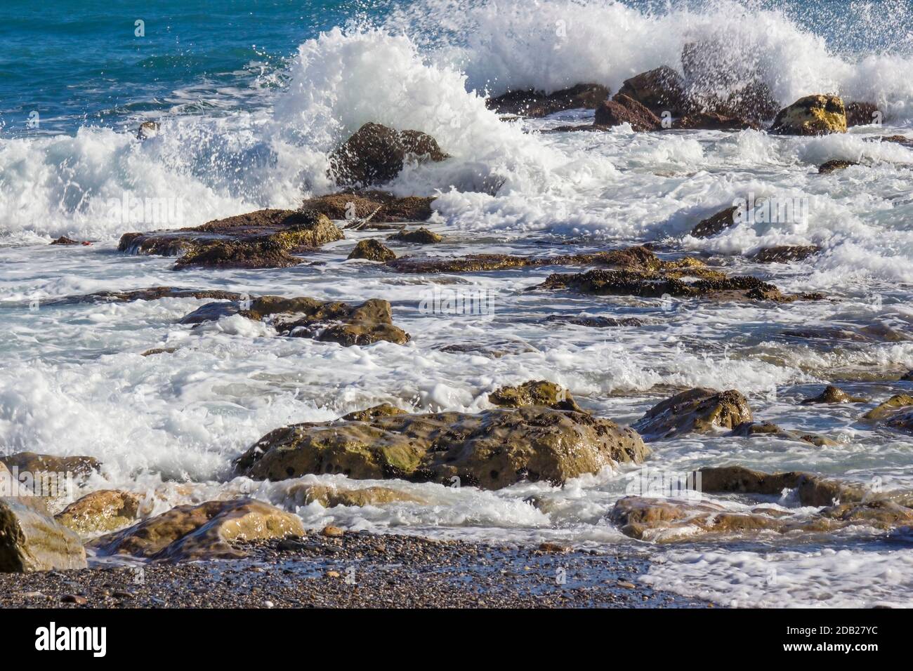 Stone beach in Almunecar, Andalusia, Spain Stock Photo - Alamy