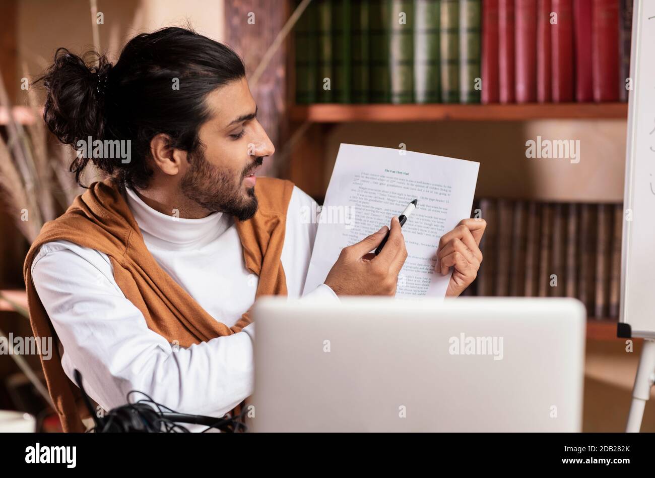 Arab Teacher At Laptop Computer Having Online Class At Home Stock Photo ...