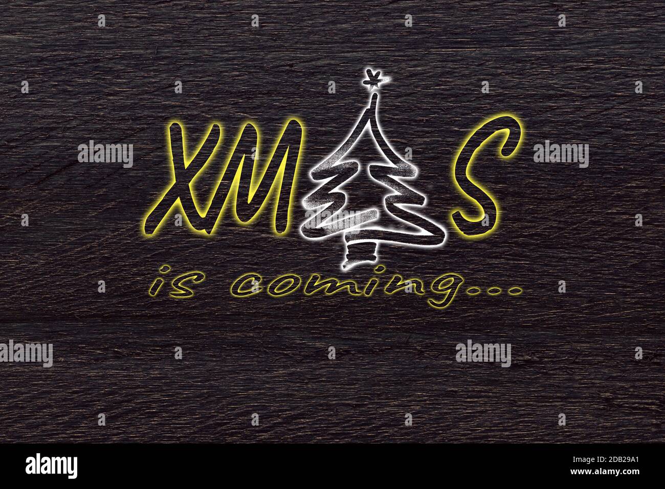 Xmas logo on brown wood concept background Stock Photo - Alamy