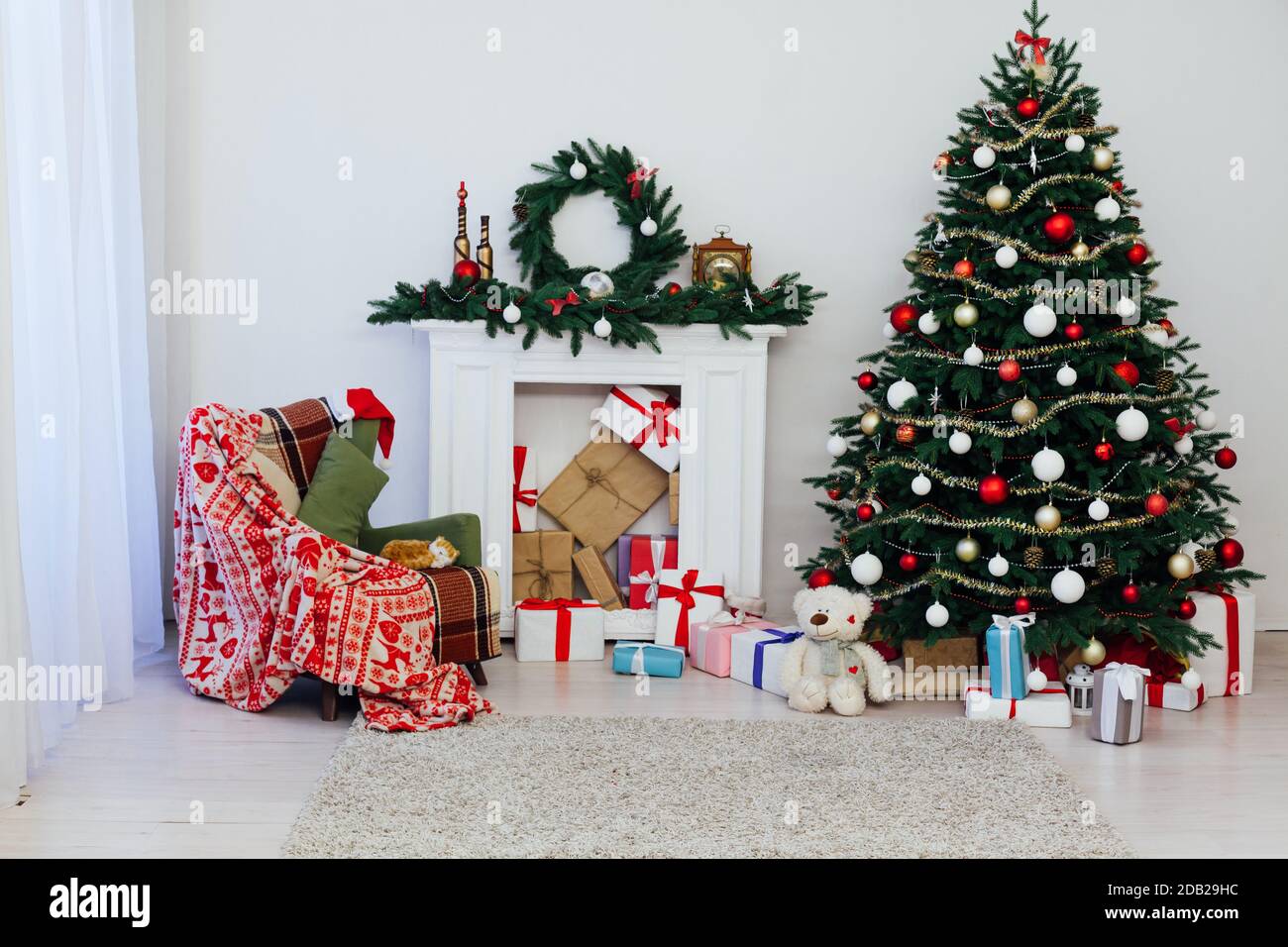 New Year's Eve Christmas Tree With Gifts Stock Photo - Alamy