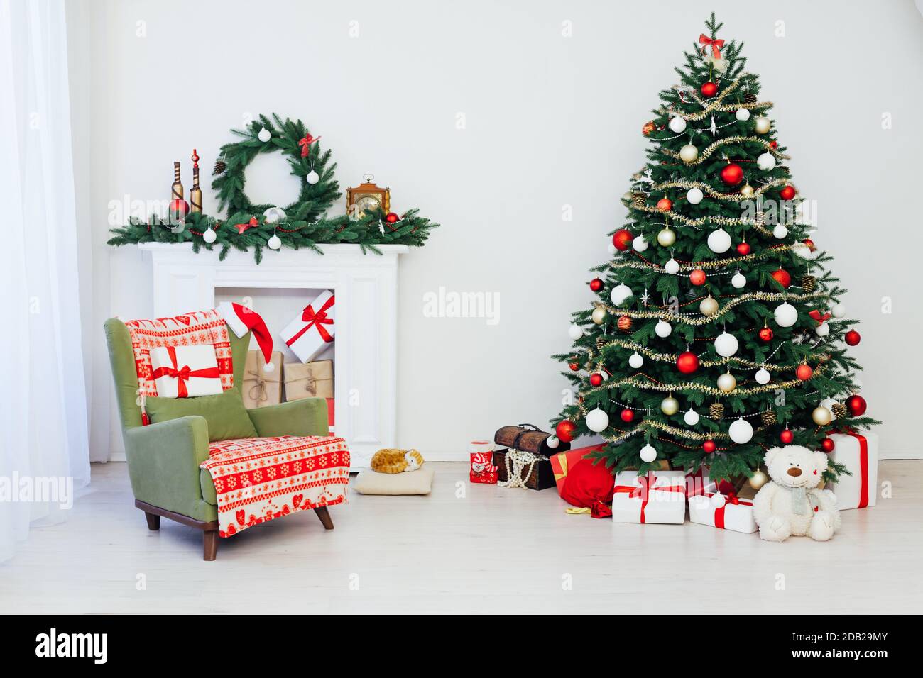New Year's Eve Christmas Tree With Gifts Decor Stock Photo - Alamy