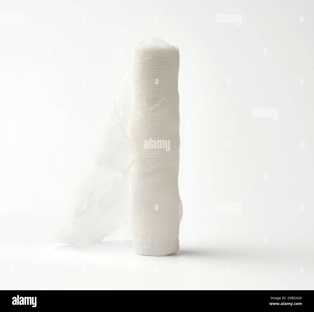 roll of white gauze bandage on a white background, medical item for ...