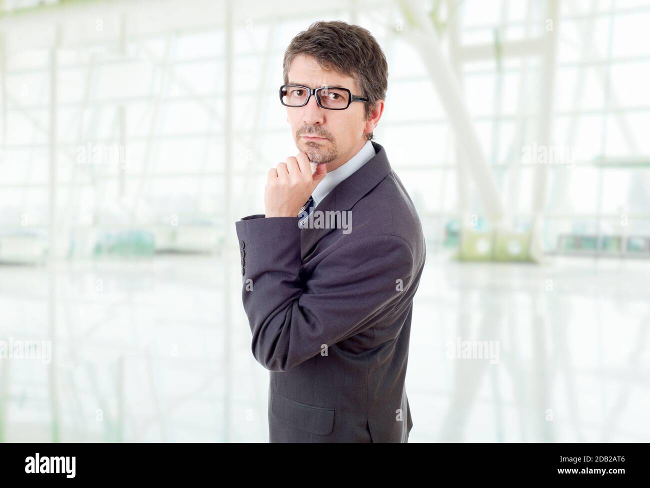 young business man thinking at the office Stock Photo - Alamy