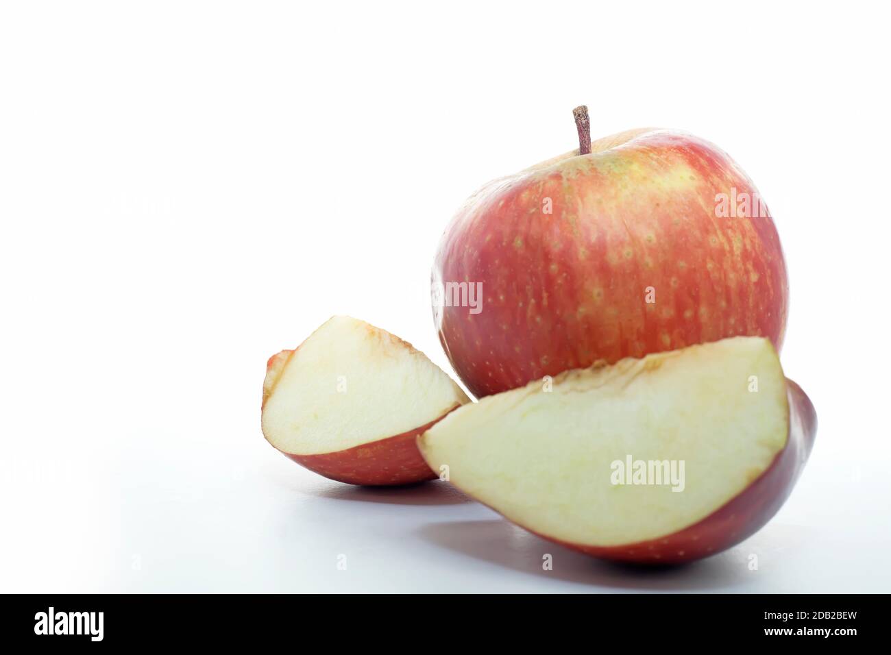 Ripe red apple fruit with apple half isolated on white backgrounds ...