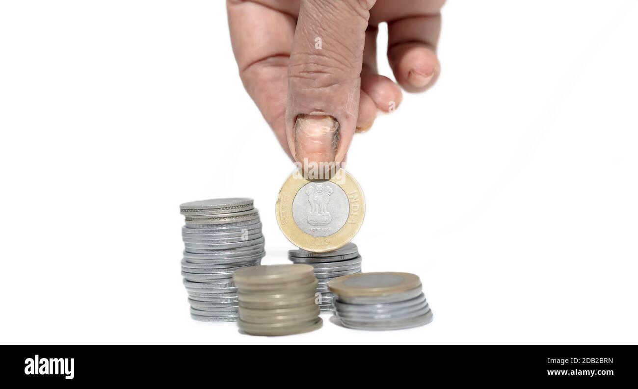Hand with Indian currency coins isolated on white backgrounds Stock ...
