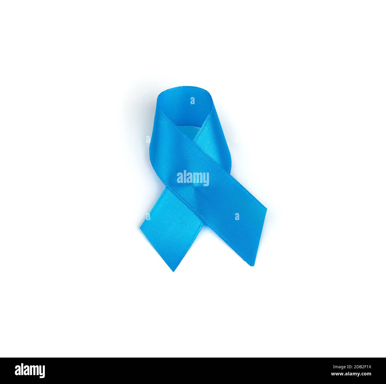 blue silk ribbon wrapped in a loop and isolated on a white background ...