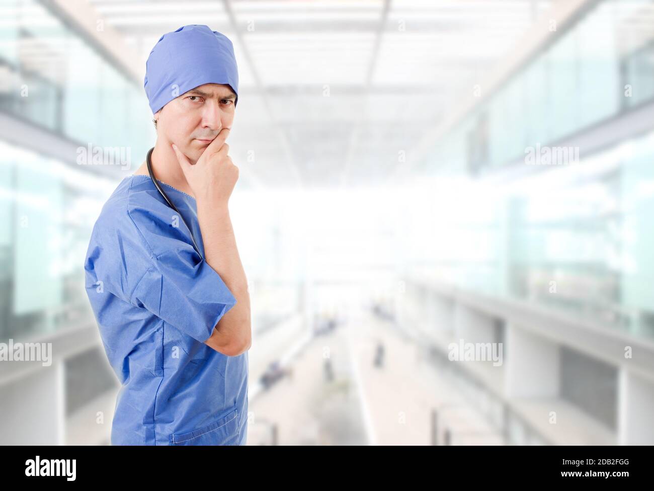male doctor thinking at the hospital Stock Photo - Alamy