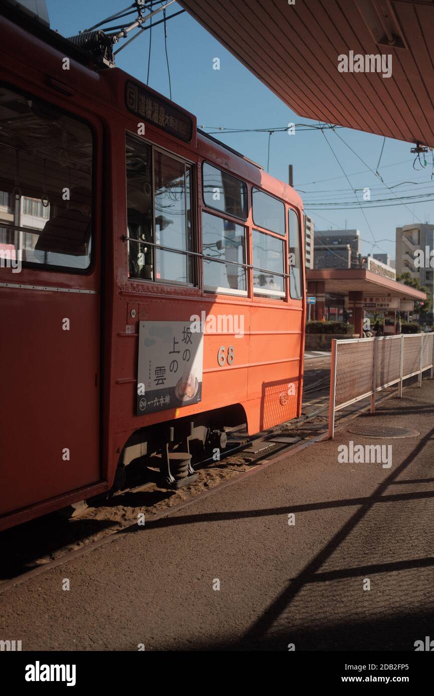 A vertical shot of an old orange tramway in the station Stock Photo - Alamy