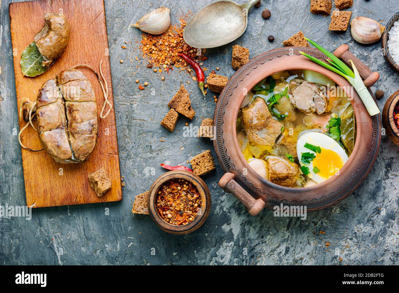 Homemade soup with meat, egg and sausage Stock Photo - Alamy