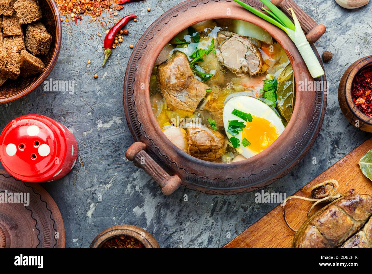 Homemade soup with meat, egg and sausage Stock Photo - Alamy