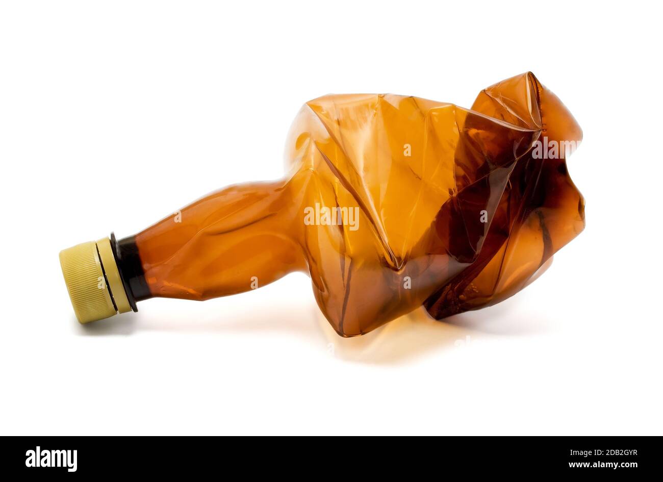 Squashed plastic bottle isolated on white background Stock Photo - Alamy