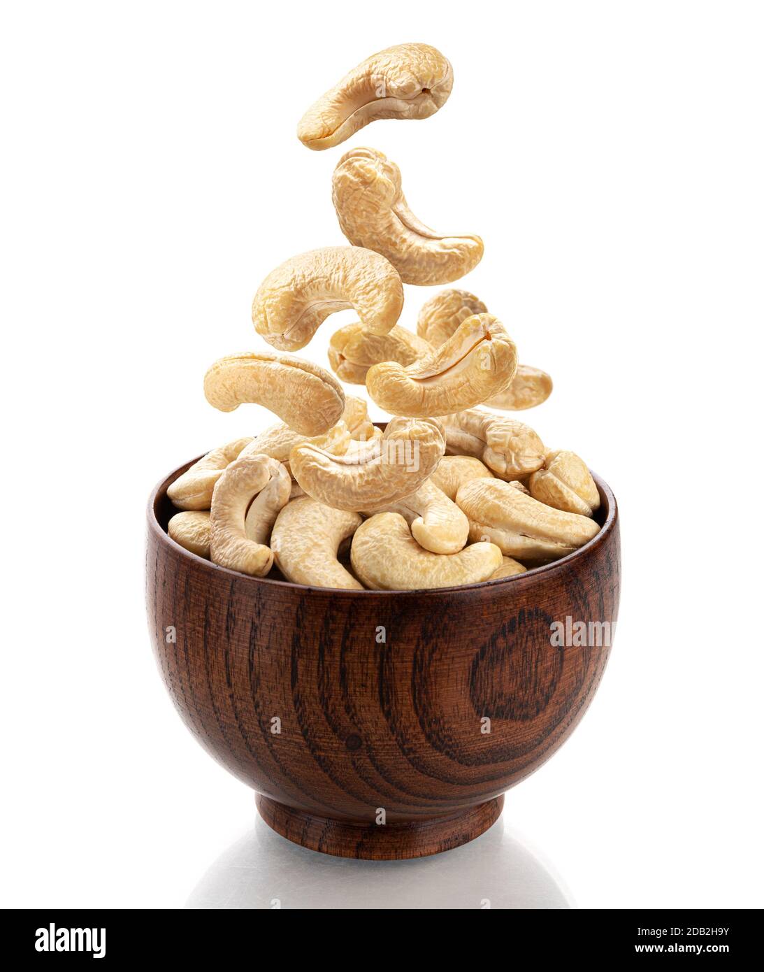 Falling cashew nuts isolated on white background Stock Photo - Alamy