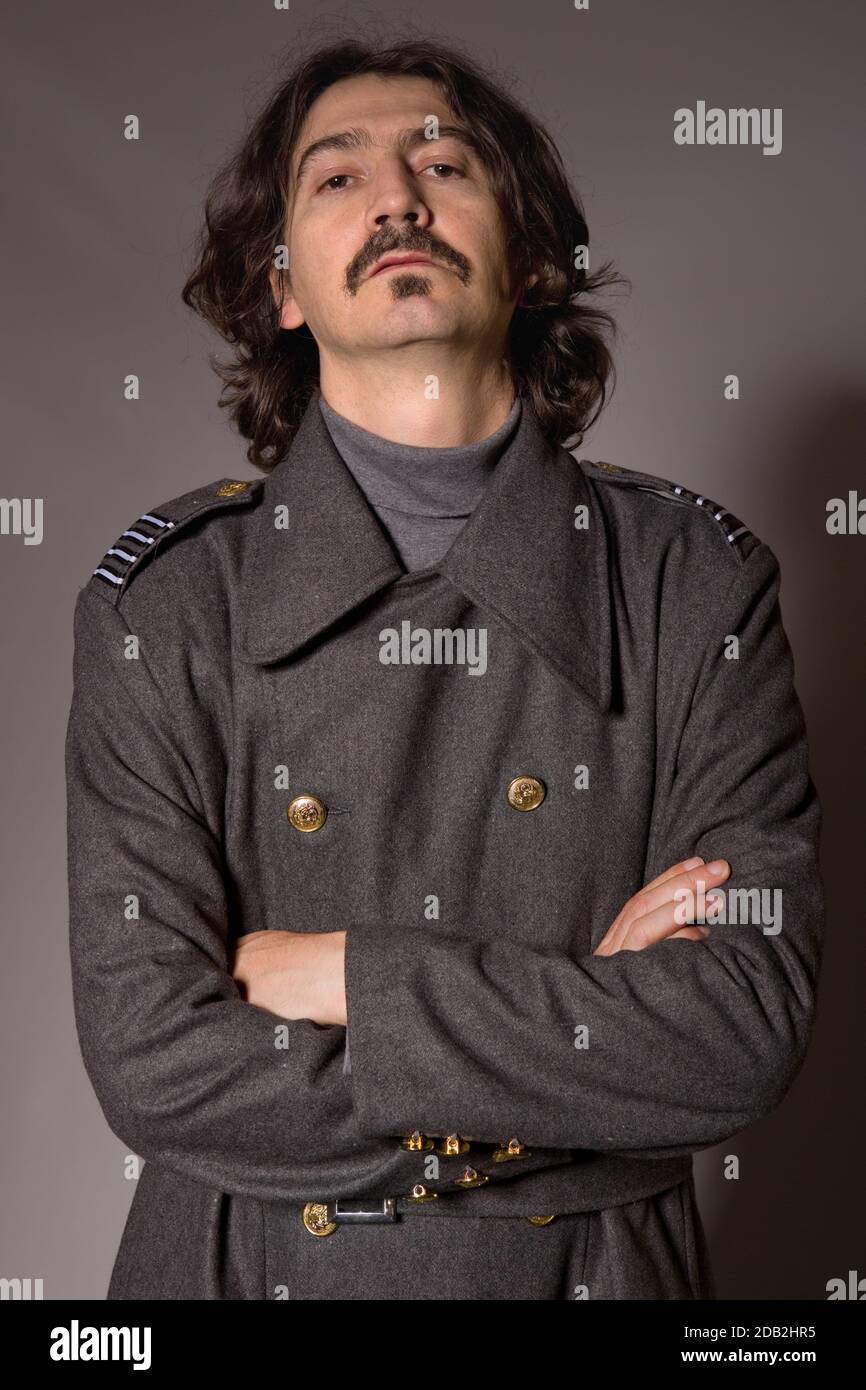 young man dressed as russian military, studio picture Stock Photo - Alamy