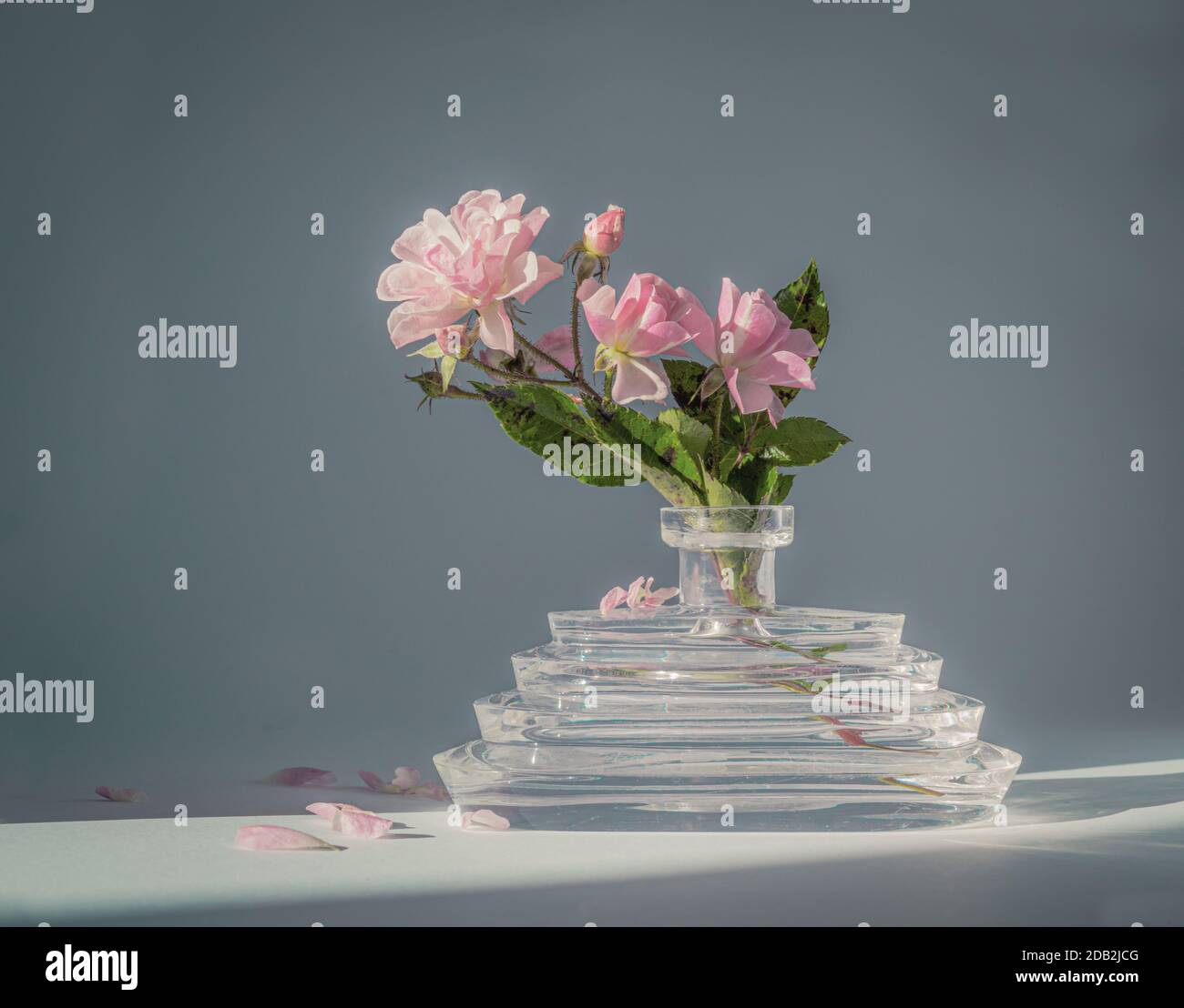 Imagine opening this pretty perfume bottle ... a tiny bouquet of roses ...