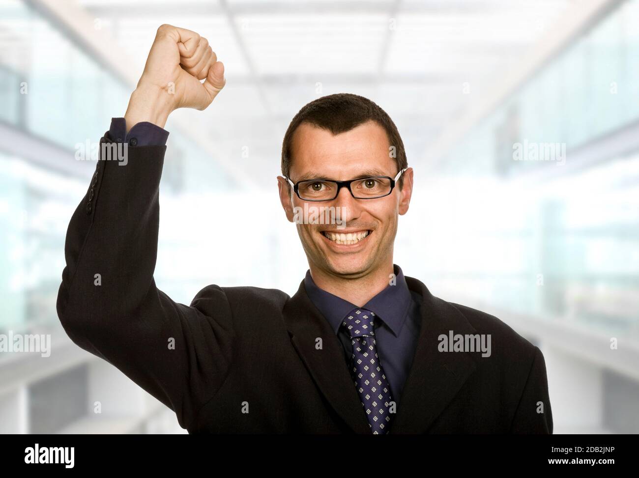 successful business man with open arm winning Stock Photo - Alamy