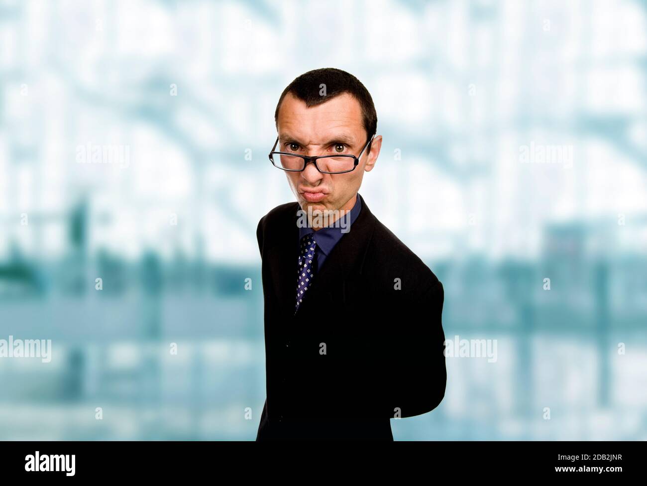young distorted business man at the office Stock Photo - Alamy