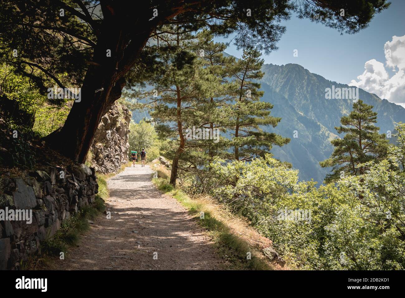 hikers climbing a mountain path in the Pyrenees in France Stock Photo ...