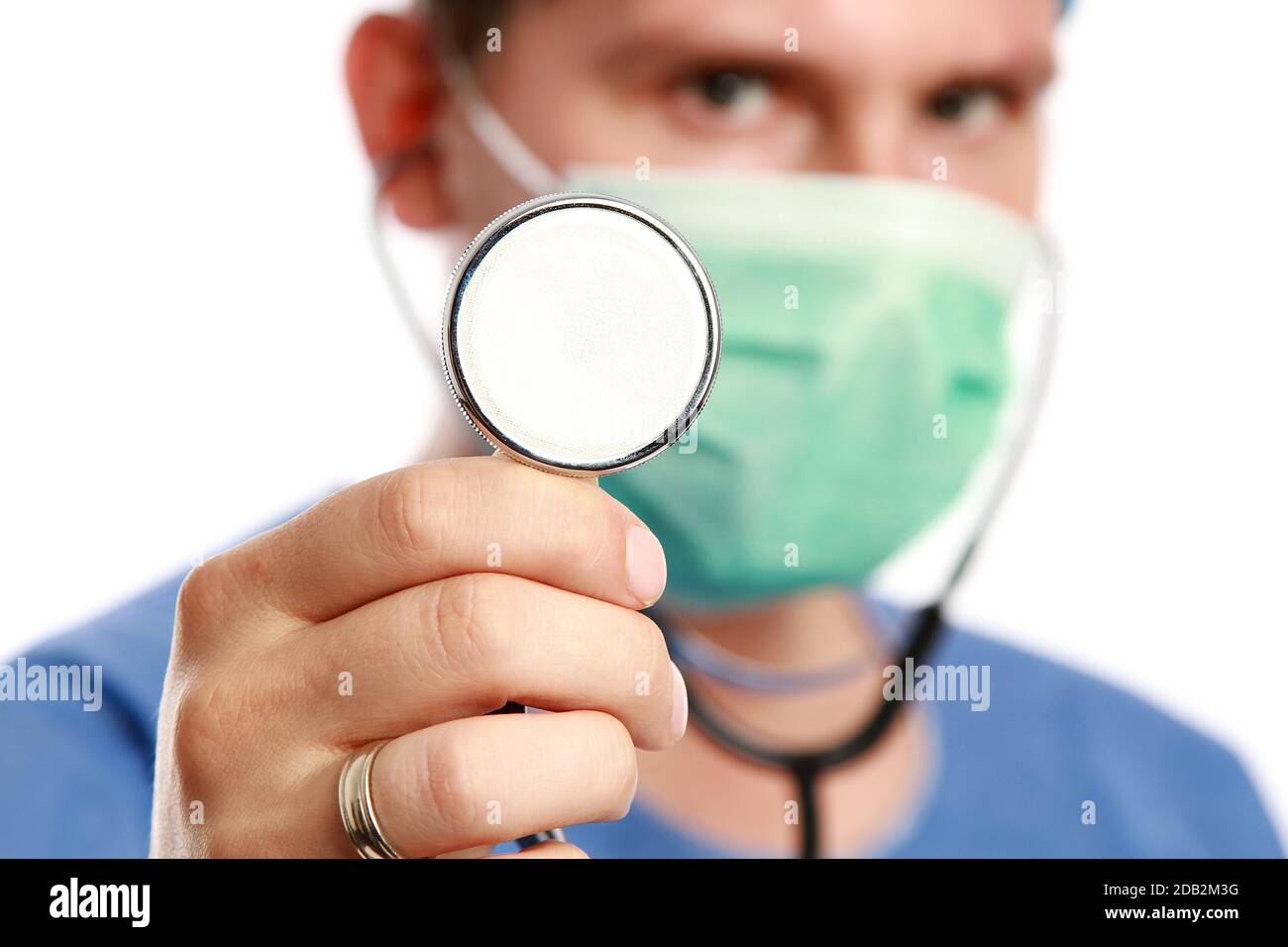 A vertical shot of a young doctor with a stethoscope isolated on white ...